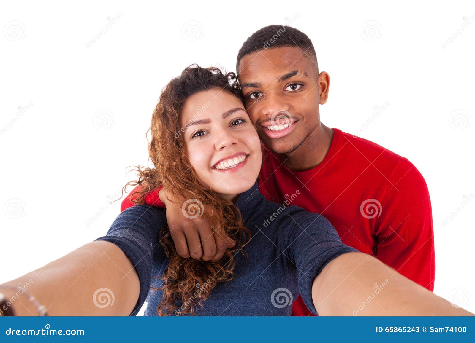 Happy Mixed Race Couple Taking A Selfie Photo Over A White Background