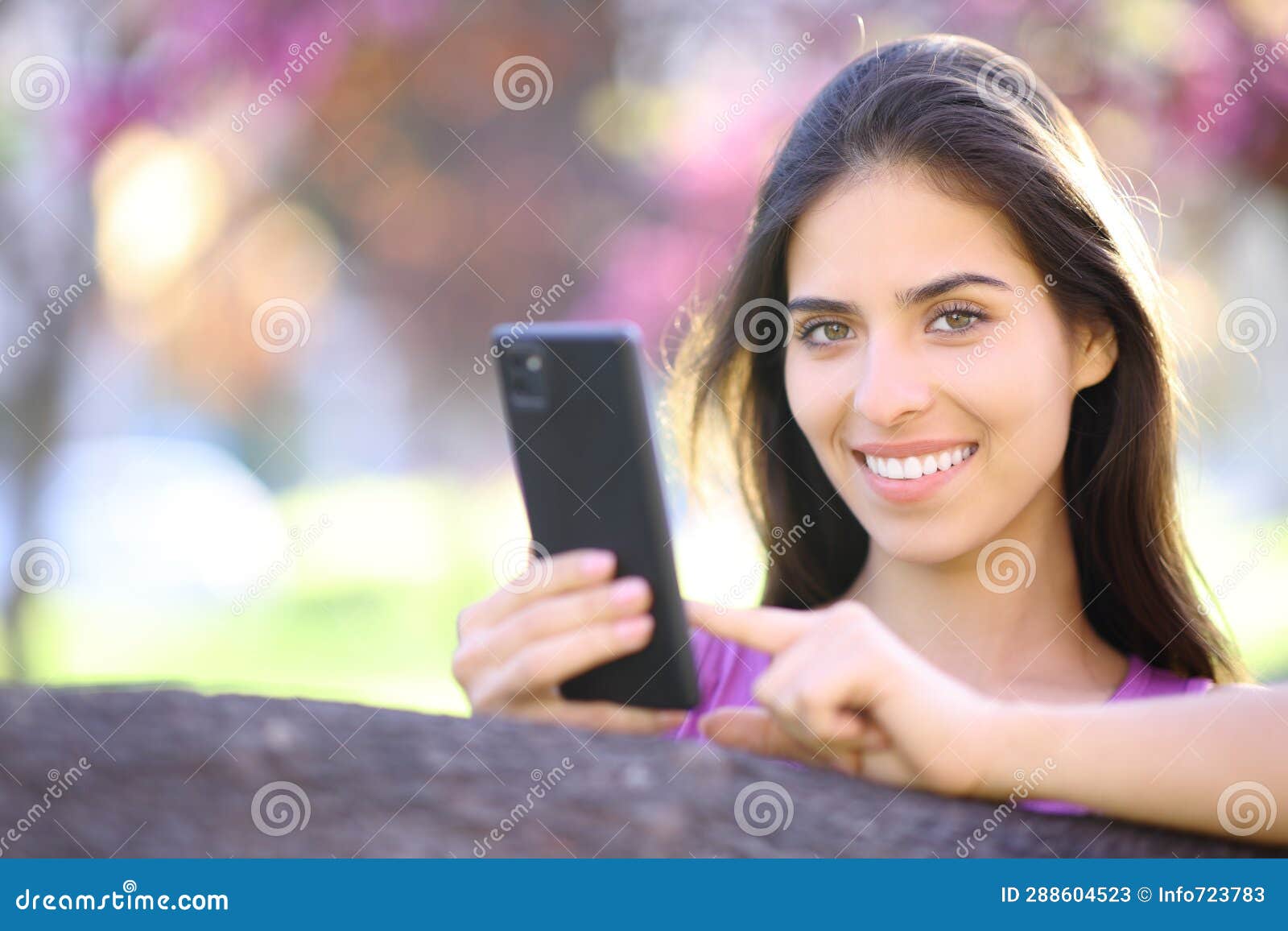 Happy Mobile Phone User Looking at Camera Stock Image - Image of ...