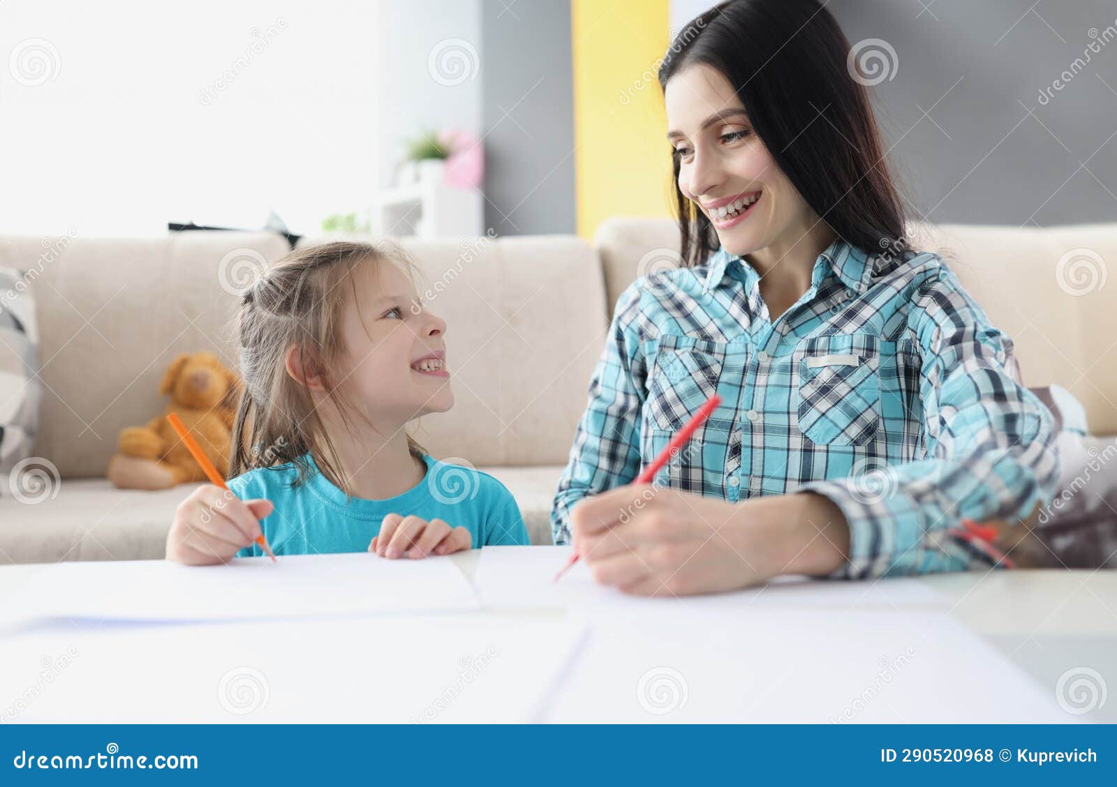 Happy Mom and Daughter Draw with Pencils on Paper Stock Photo - Image ...
