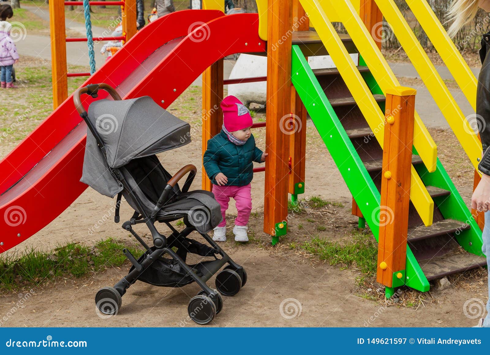 Happy Mom and Daughter Play on the Playground. Stock Image - Image of ...