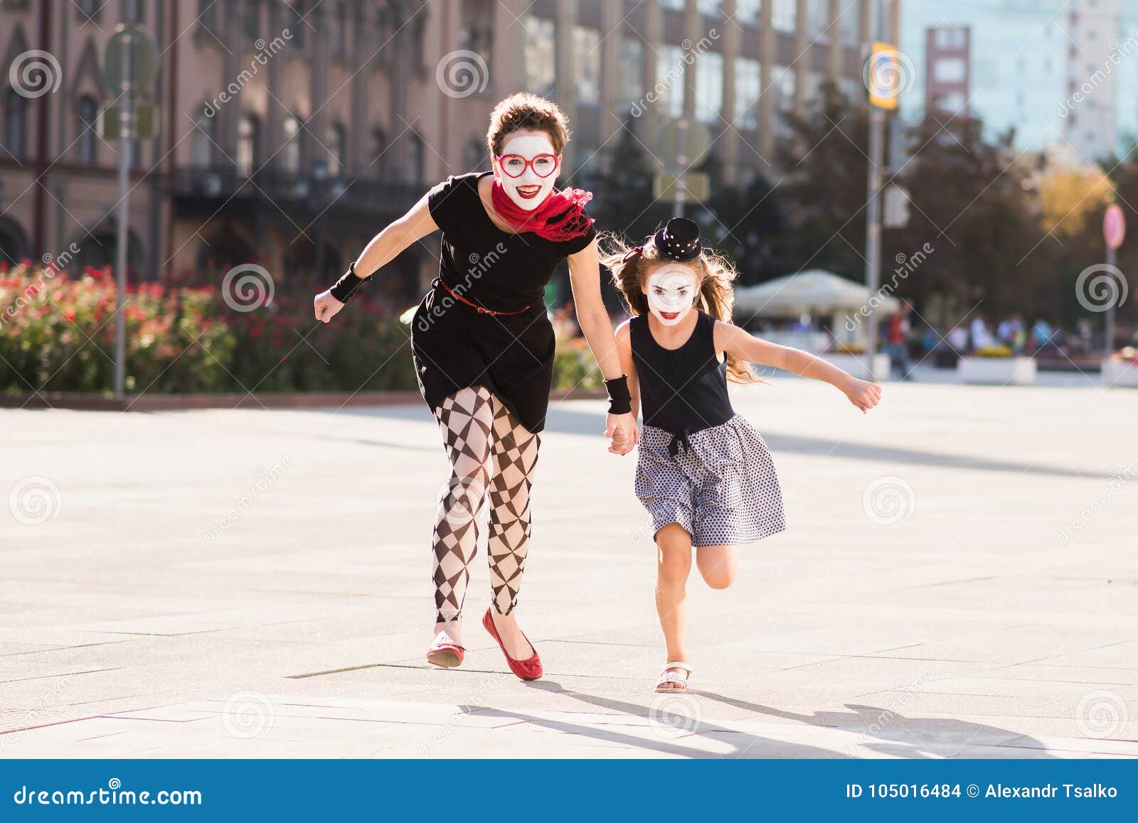 Mom and Daughter are Running Along the Road Stock Photo - Image of ...