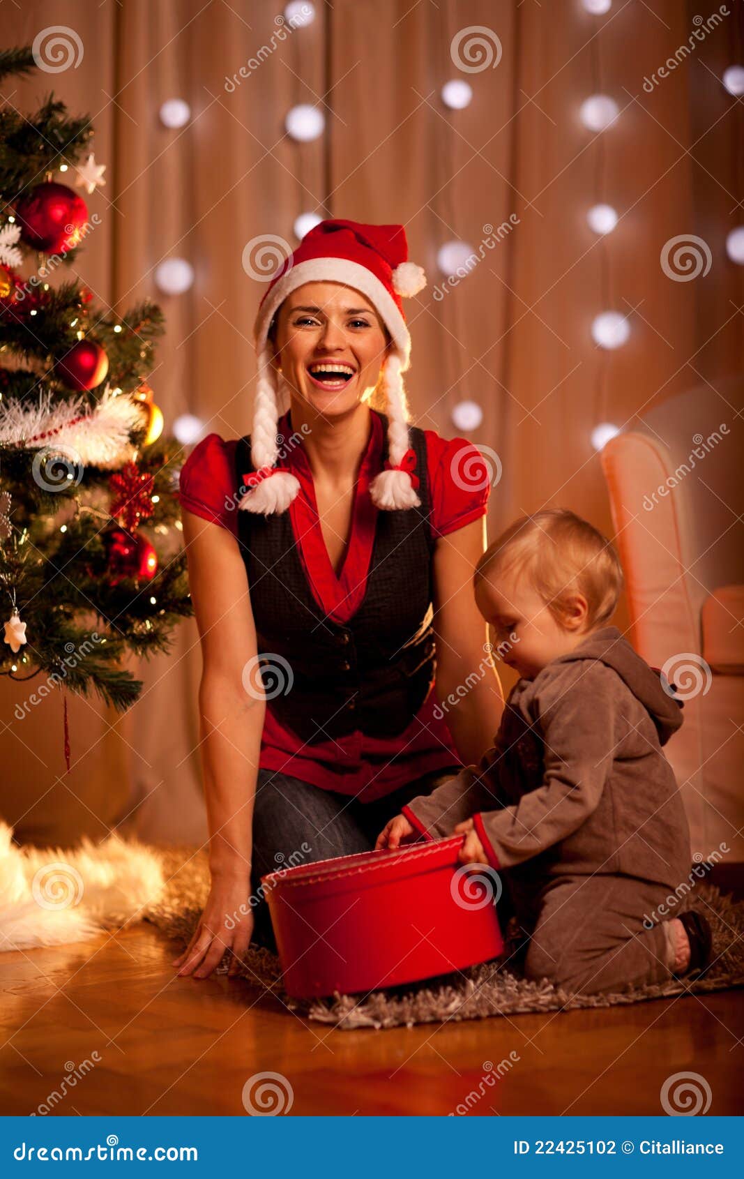Happy Mother with Baby Opening Present Box Stock Photo - Image of ...