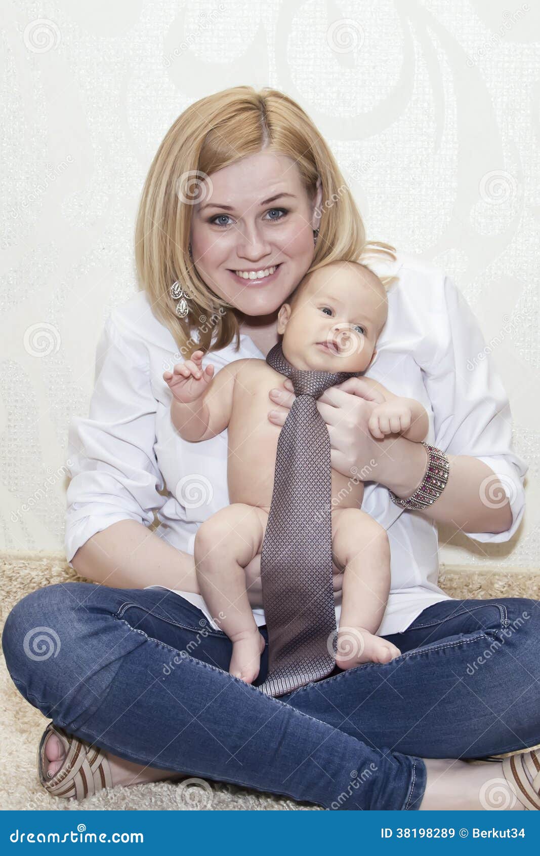 Happy Mother and a Contented Baby Stock Image - Image of baby, mother ...