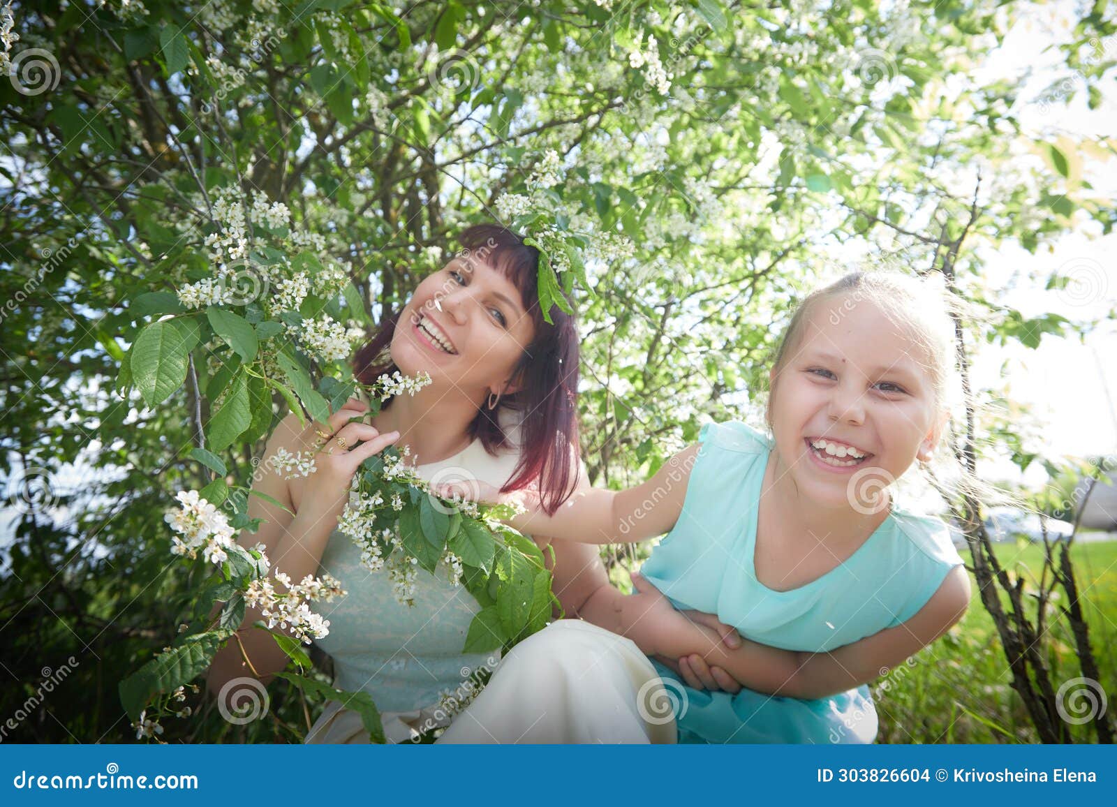 Happy Mother And Daughter Enjoying Rest Playing And Fun On Nature On A