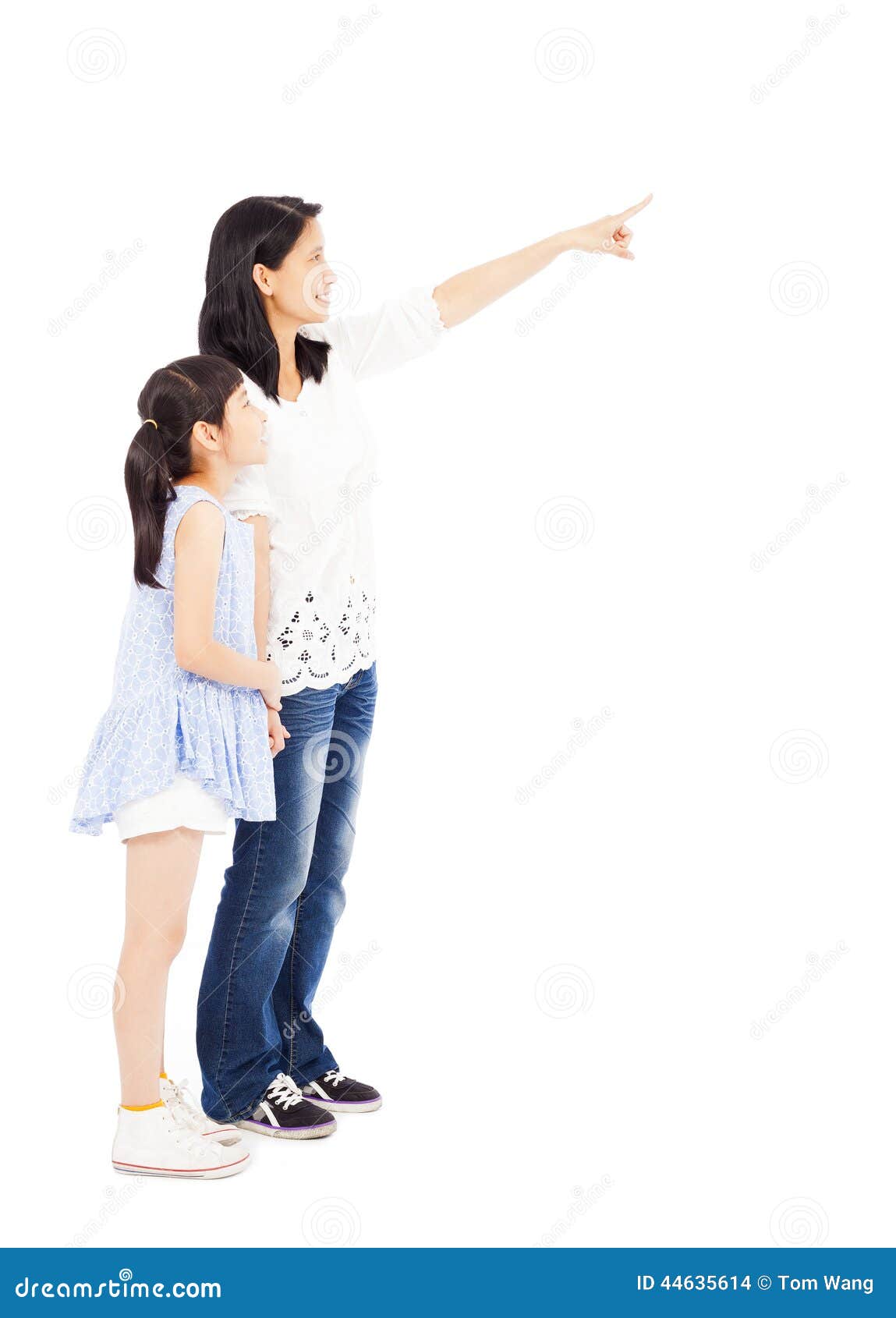 Happy Mother and Daughter Looking and Pointing Stock Photo - Image of ...