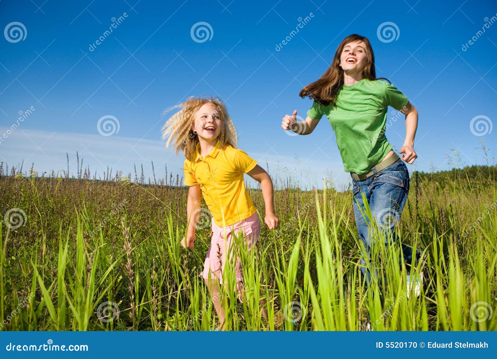 Happy Mother and Daughter Run on Field Stock Photo - Image of outdoor ...