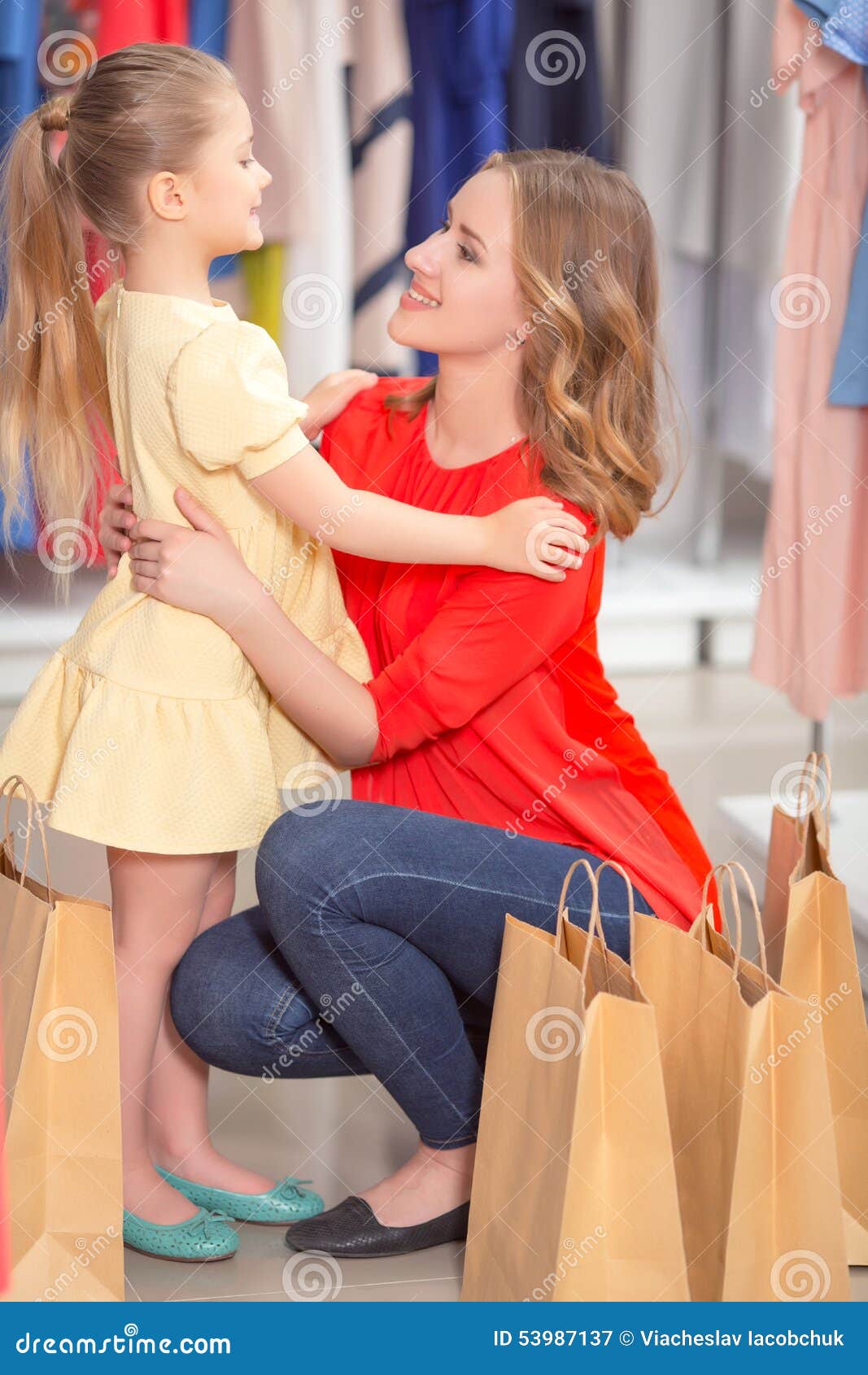 Happy Mother With Her Daughter And Lots Of New Stock Image Image Of