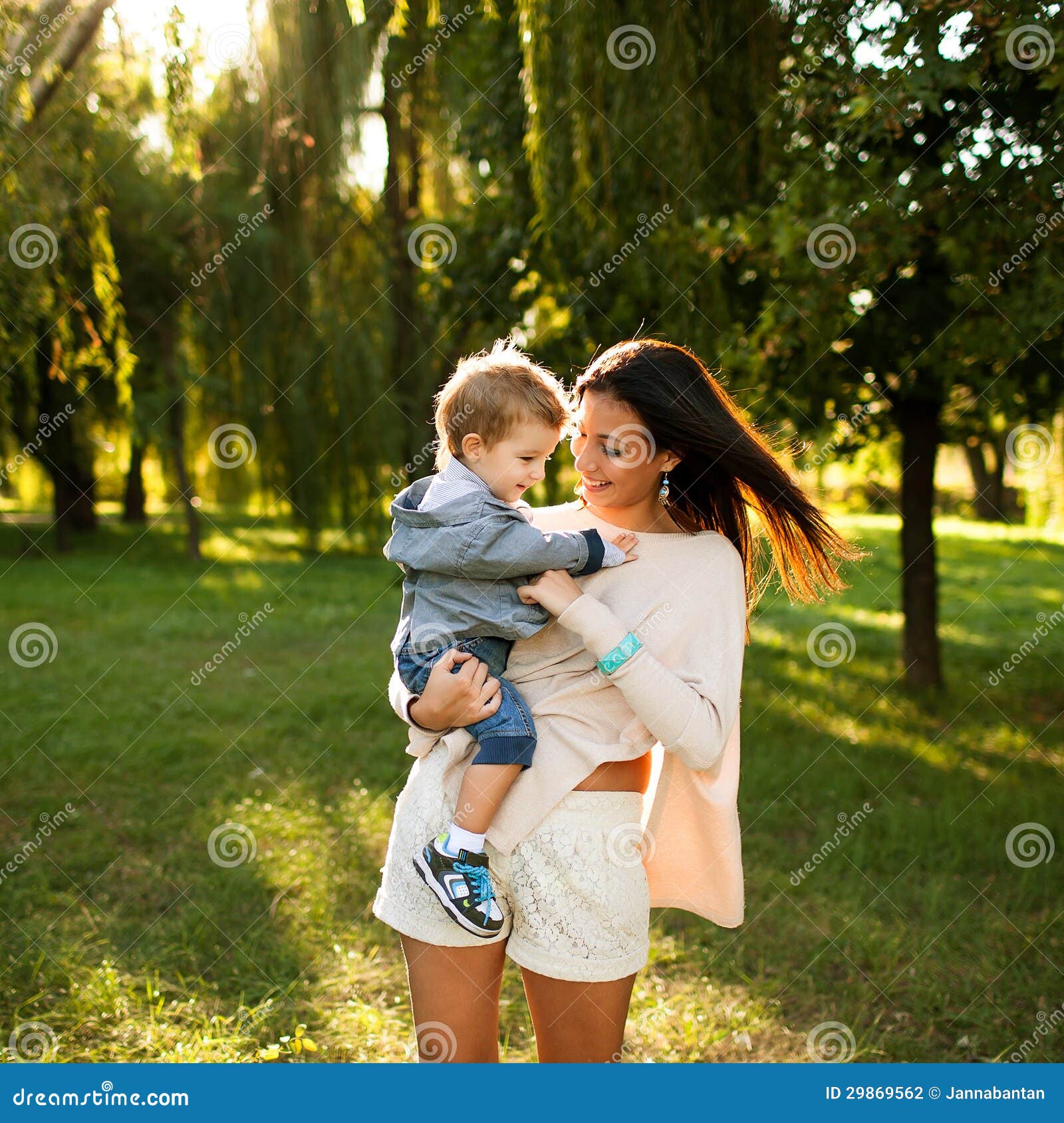 Mum and son in the park stock photo. Image of blue, copyspace - 29869562