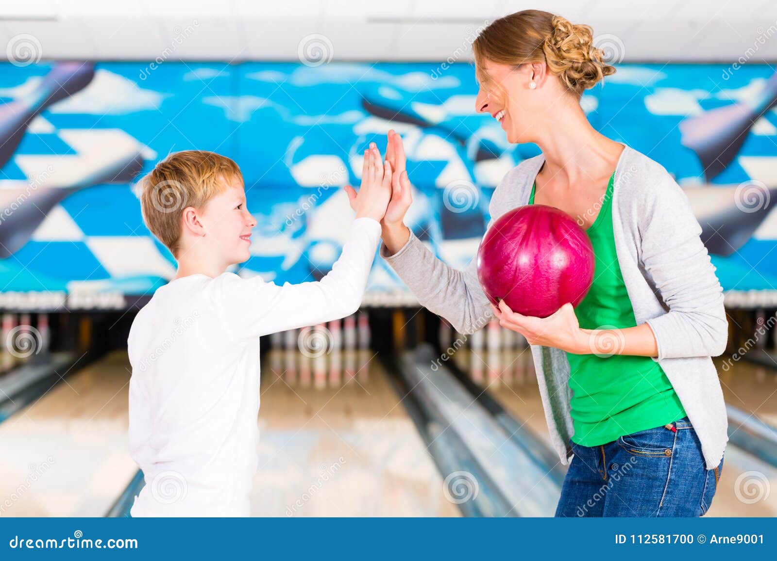 Mother and Son Playing Together at Bowling Center Stock Photo - Image ... Mother and Son Playing Together at Bowling Center Stock Photo - Image ...