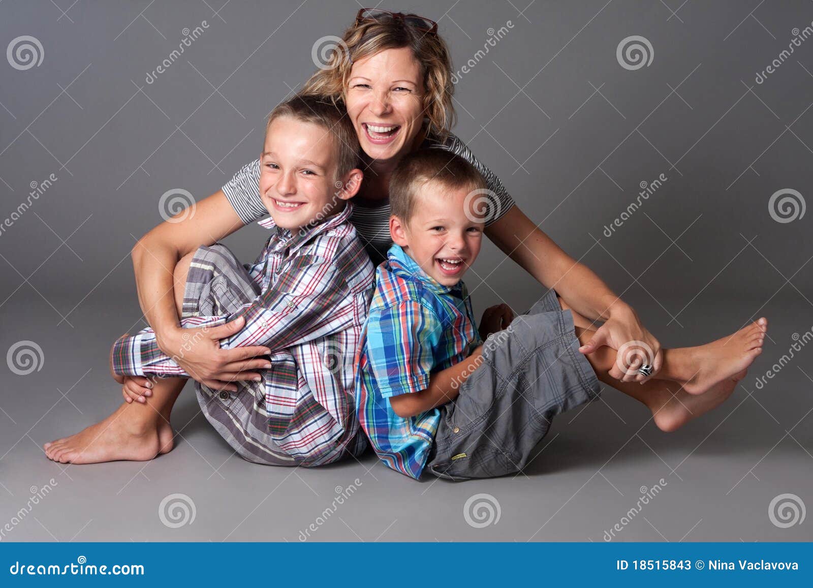 Happy mother with two boys stock image. Image of happy - 18515843