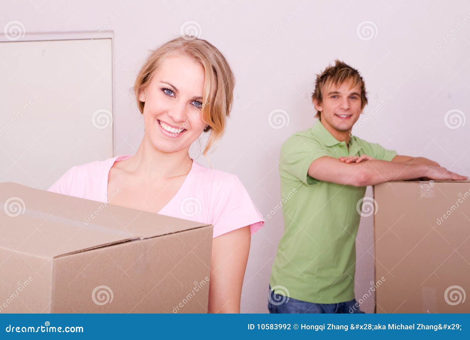 Happy moving couple stock photo. Image of good, carrying - 10583992