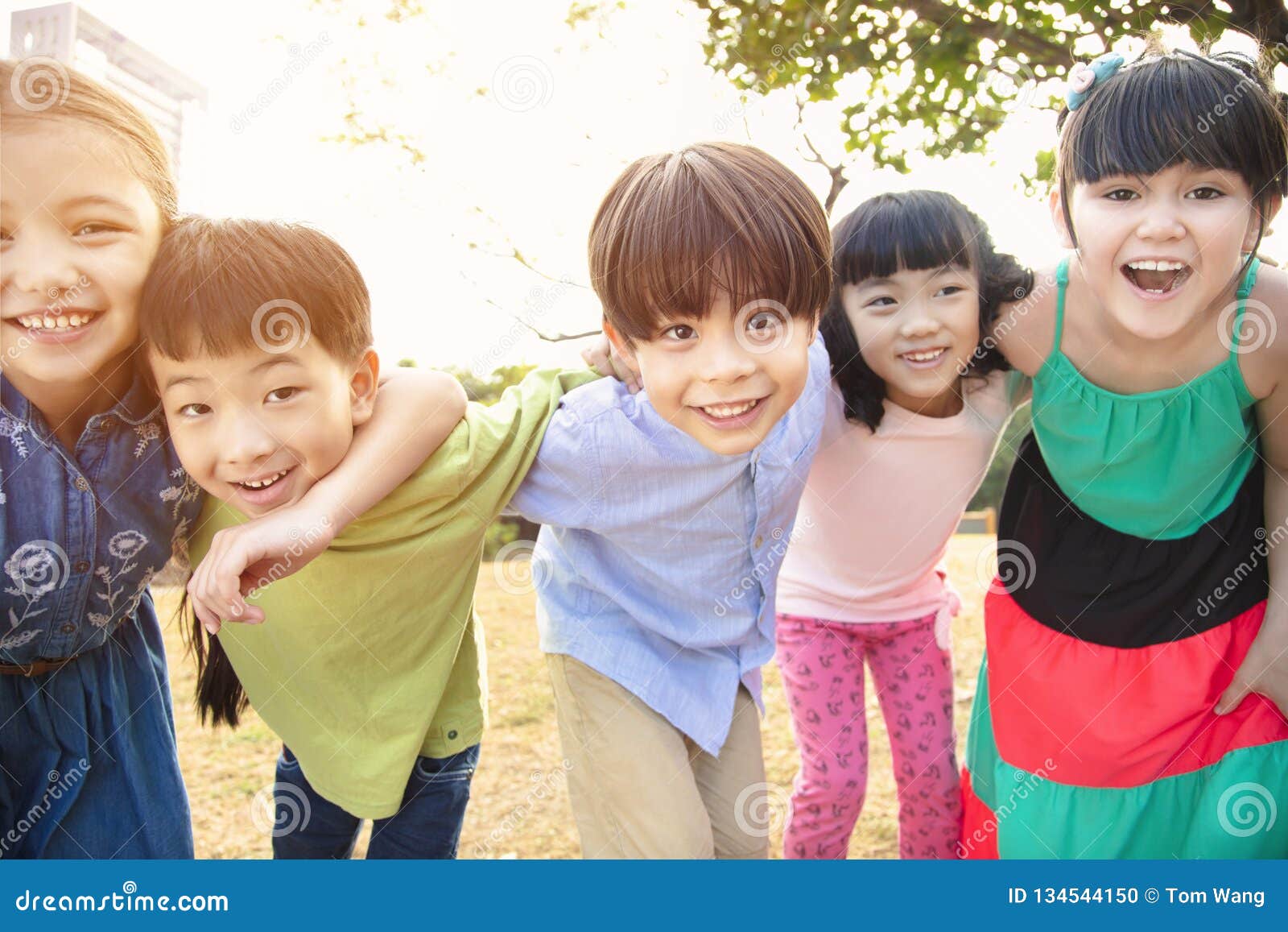 Multi-ethnic Group of Schoolchildren in Park Stock Photo - Image of ... Multi-ethnic Group of Schoolchildren in Park Stock Photo - Image of ...