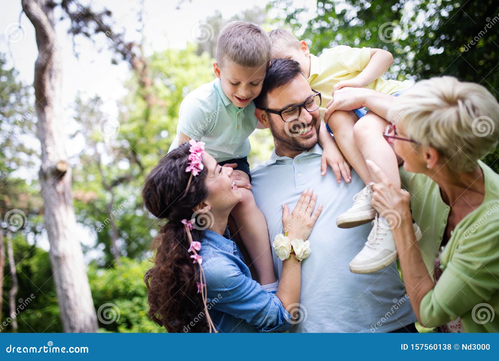 Multi Generation Family Enjoying Picnic in a Park Stock Photo - Image ... Multi Generation Family Enjoying Picnic in a Park Stock Photo - Image ...