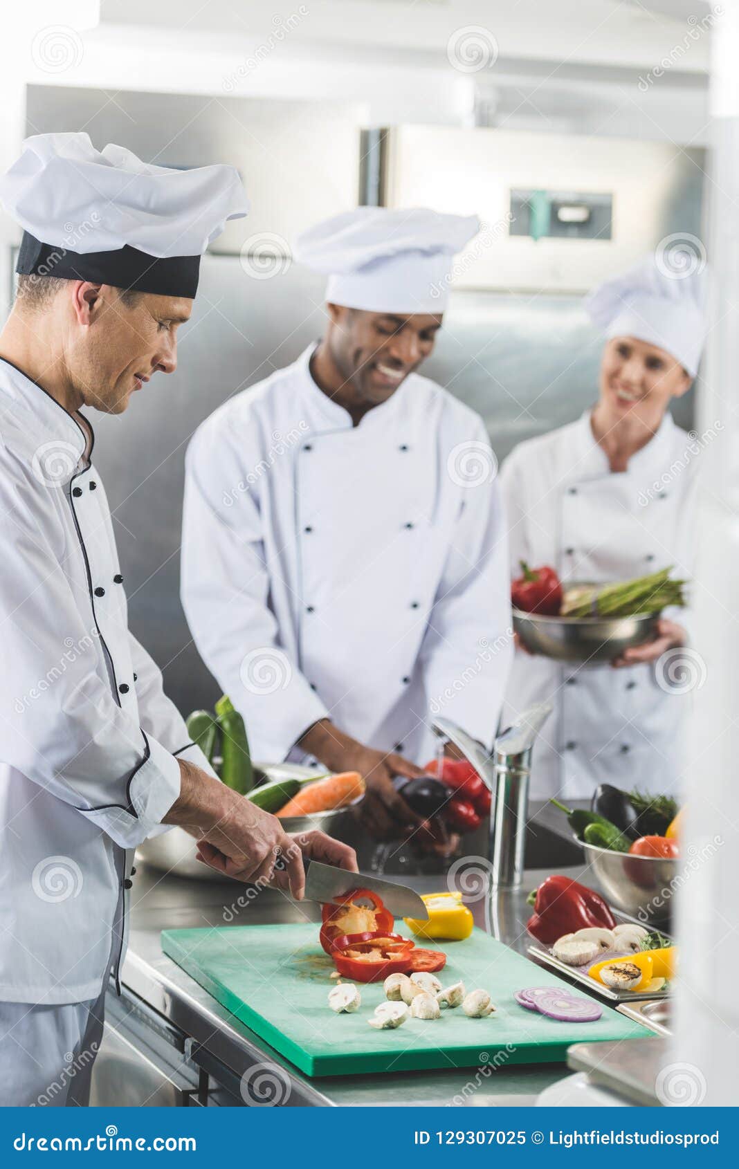 Happy Multicultural Chefs Preparing Vegetables Stock Image - Image of ...