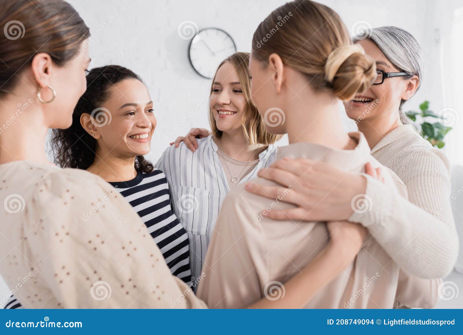 Happy Multicultural Female Team Hugging during Stock Photo - Image of ...