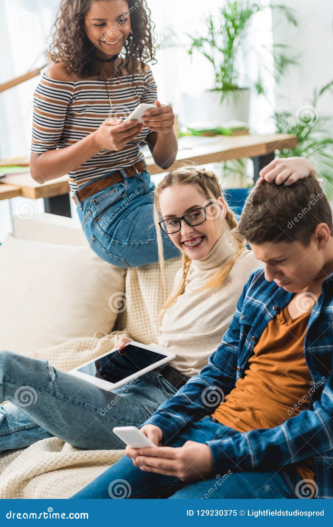Happy Multicultural Teens with Digital Stock Image - Image of smiling ...