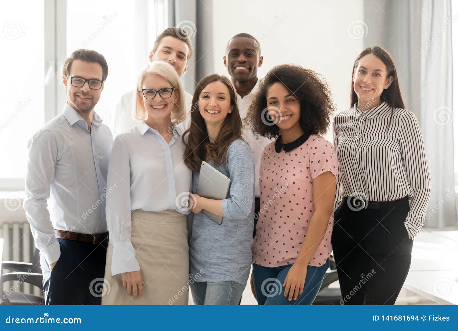Happy Multicultural Work Team Looking at Camera Posing in Office Stock ...
