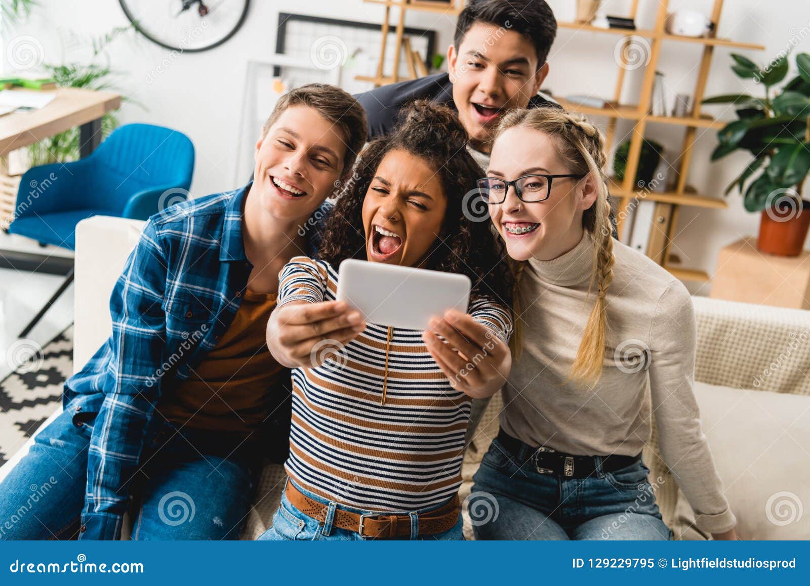 Happy Multiethnic Teenagers Taking Selfie with Smartphone Stock Image ... Happy Multiethnic Teenagers Taking Selfie with Smartphone Stock Image ...