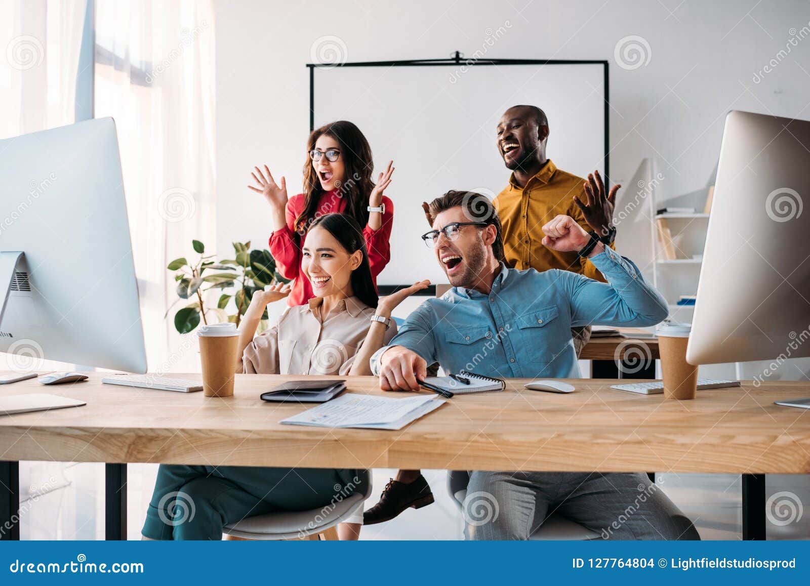 Happy Multiracial Business Team Working on Project Together Stock Photo ...