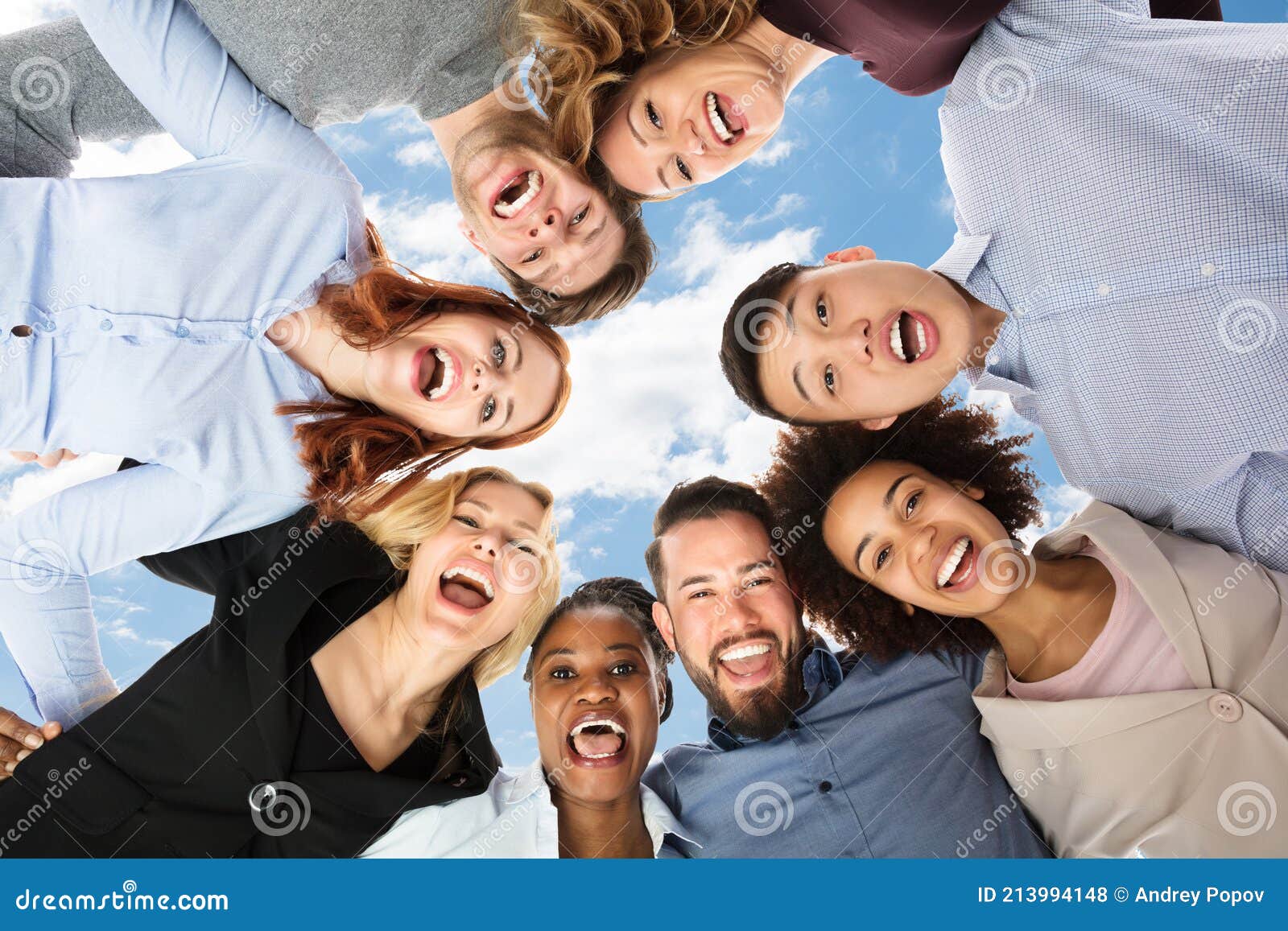 Group of Happy College Students Forming Huddle Stock Photo - Image of ...