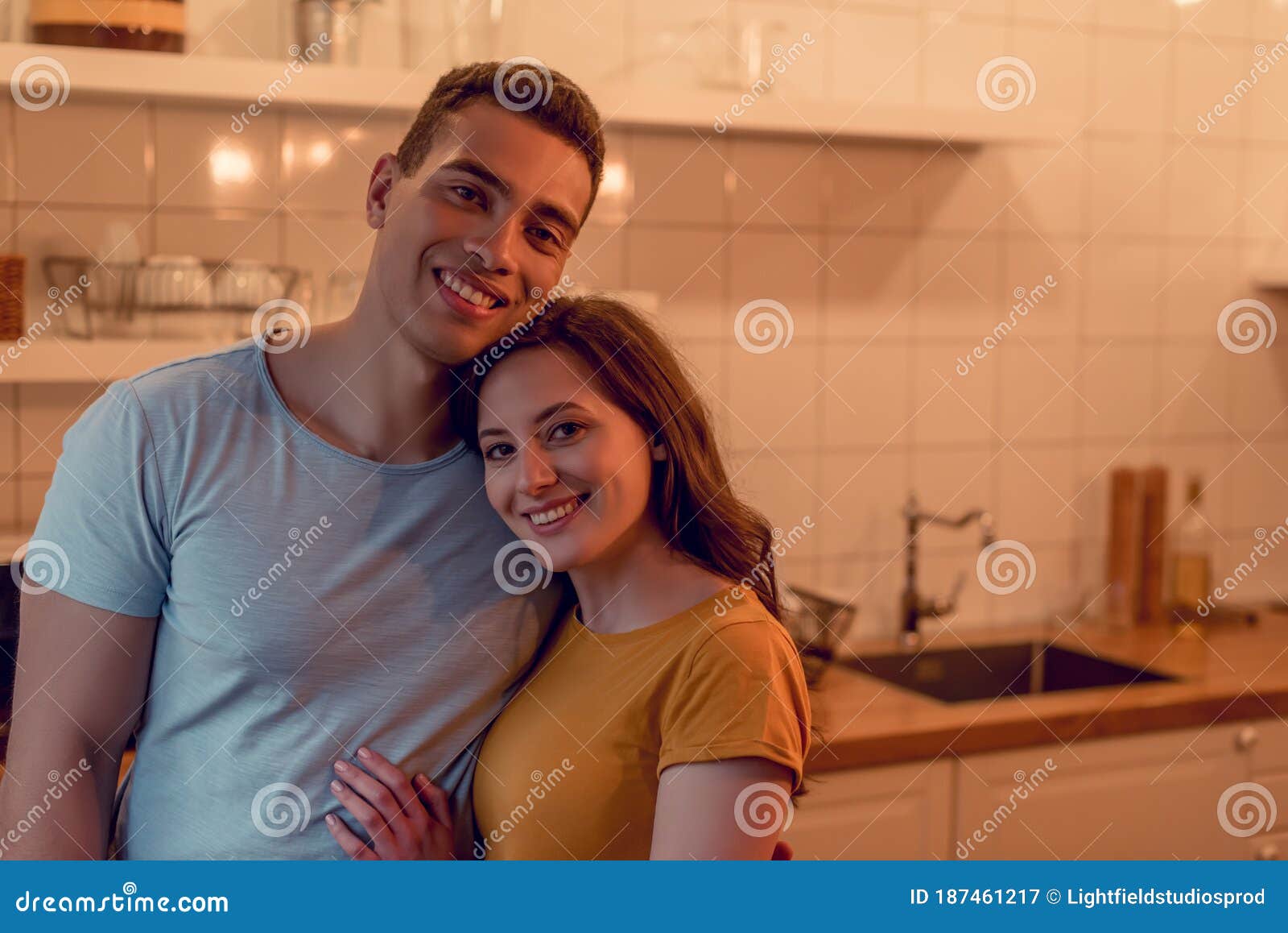 Happy Multiracial Couple Smiling While Hugging Stock Image Image Of