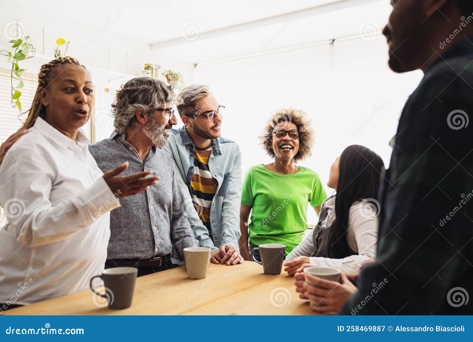 Happy Multiracial Coworkers with Different Ages and Ethnicities Having ...