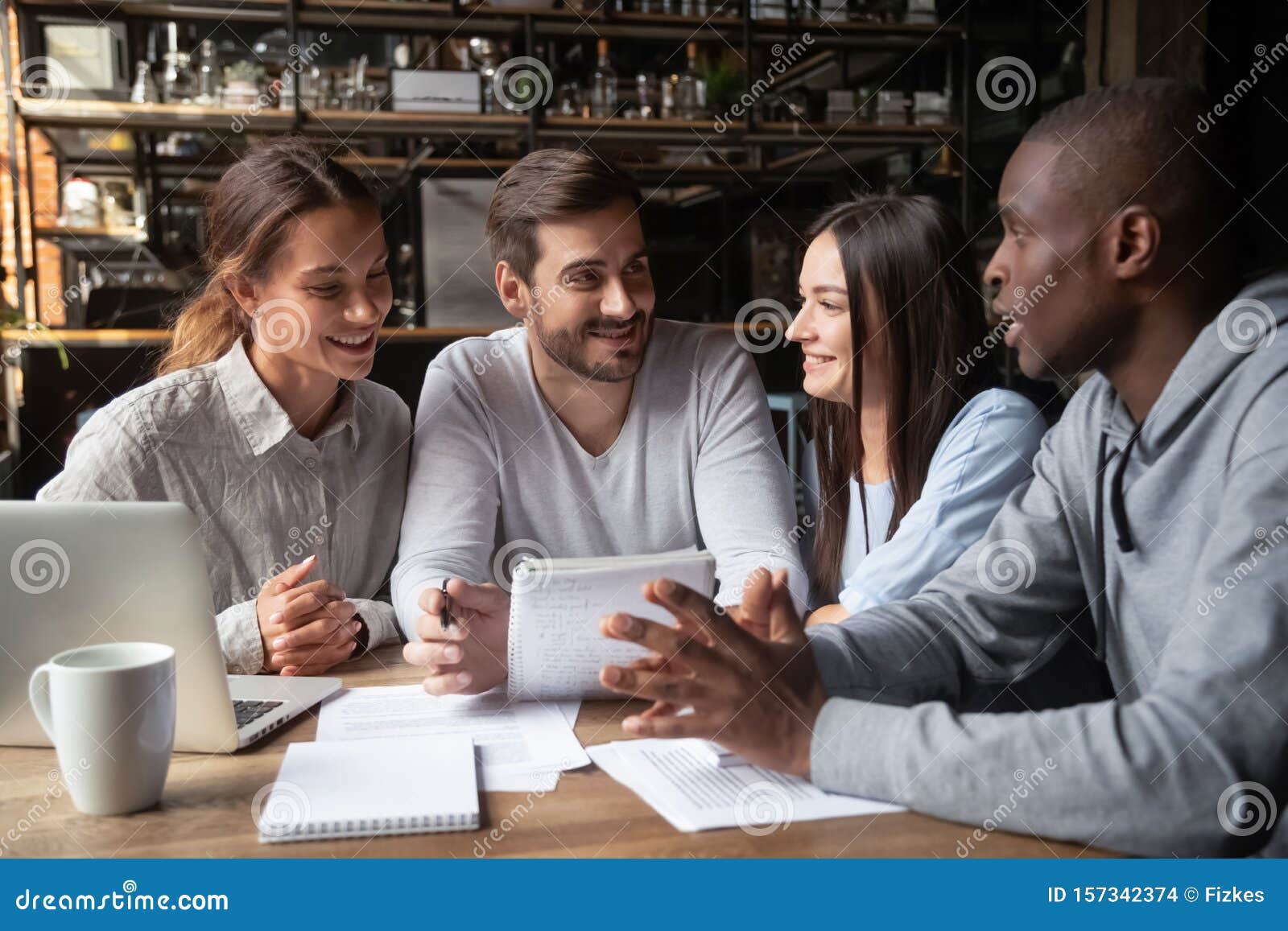 Happy Multiracial Students Group Studying Together Sit at Cafe Table ...