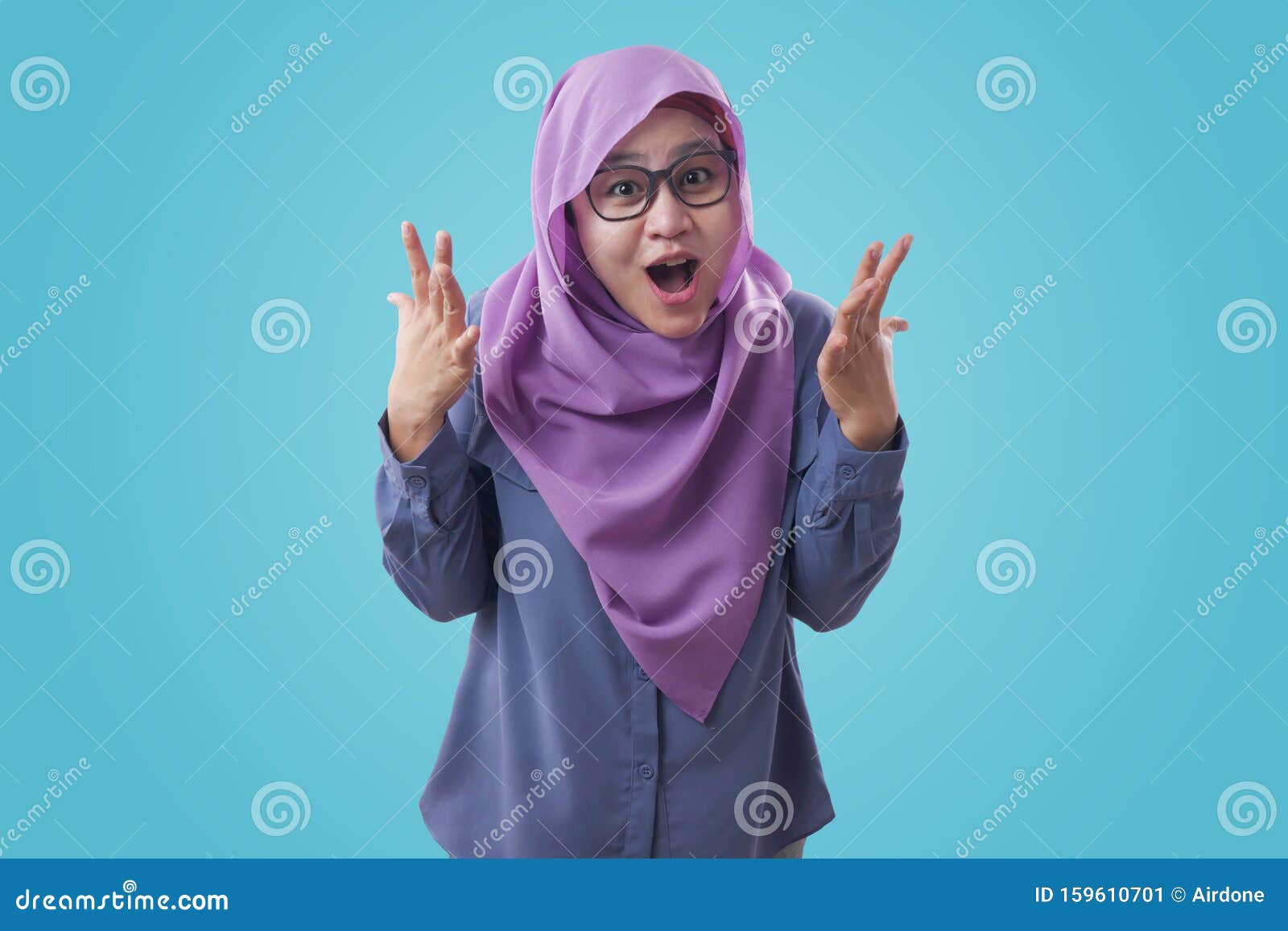 Happy Muslim Lady Shows Shocked Surprised Face With Open Mouth Stock