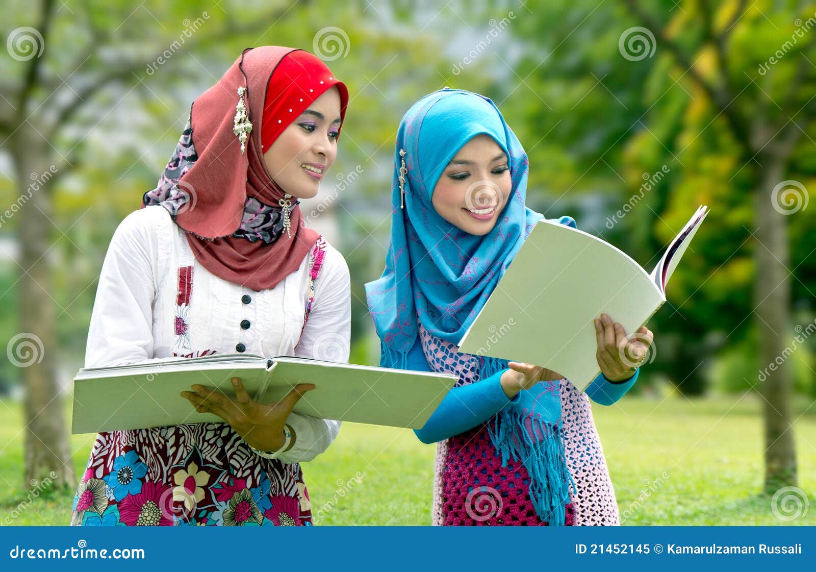 Happy muslim students stock image. Image of grass, islamic - 21452145