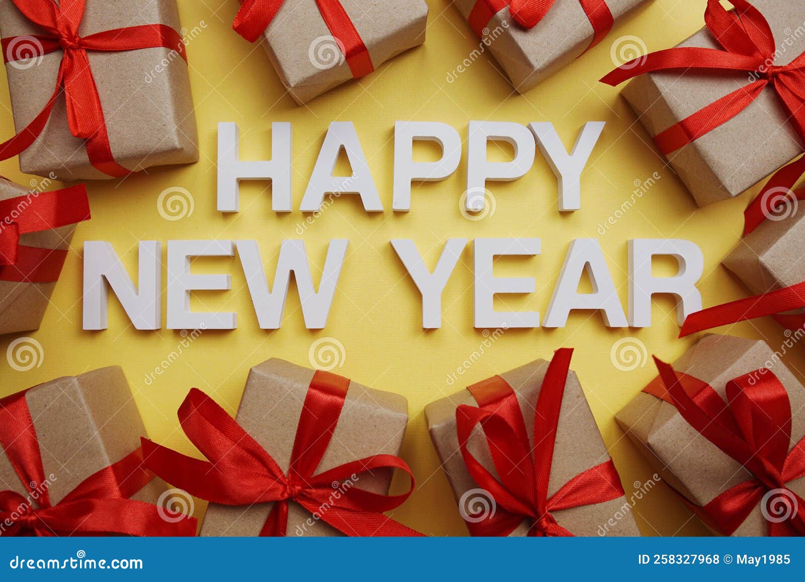 Happy New Year Alphabet Letters with Gift Boxes on Yellow Background ...