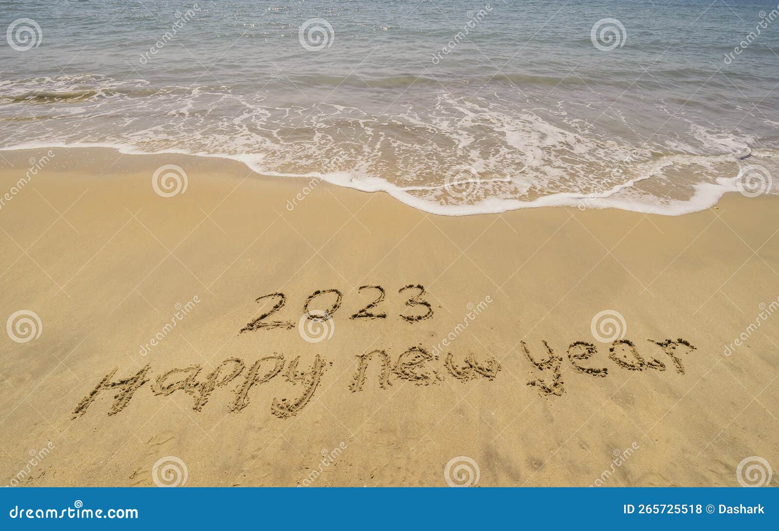 2023 Happy New Year Handwritten in Sand on Beach Stock Photo - Image of ...