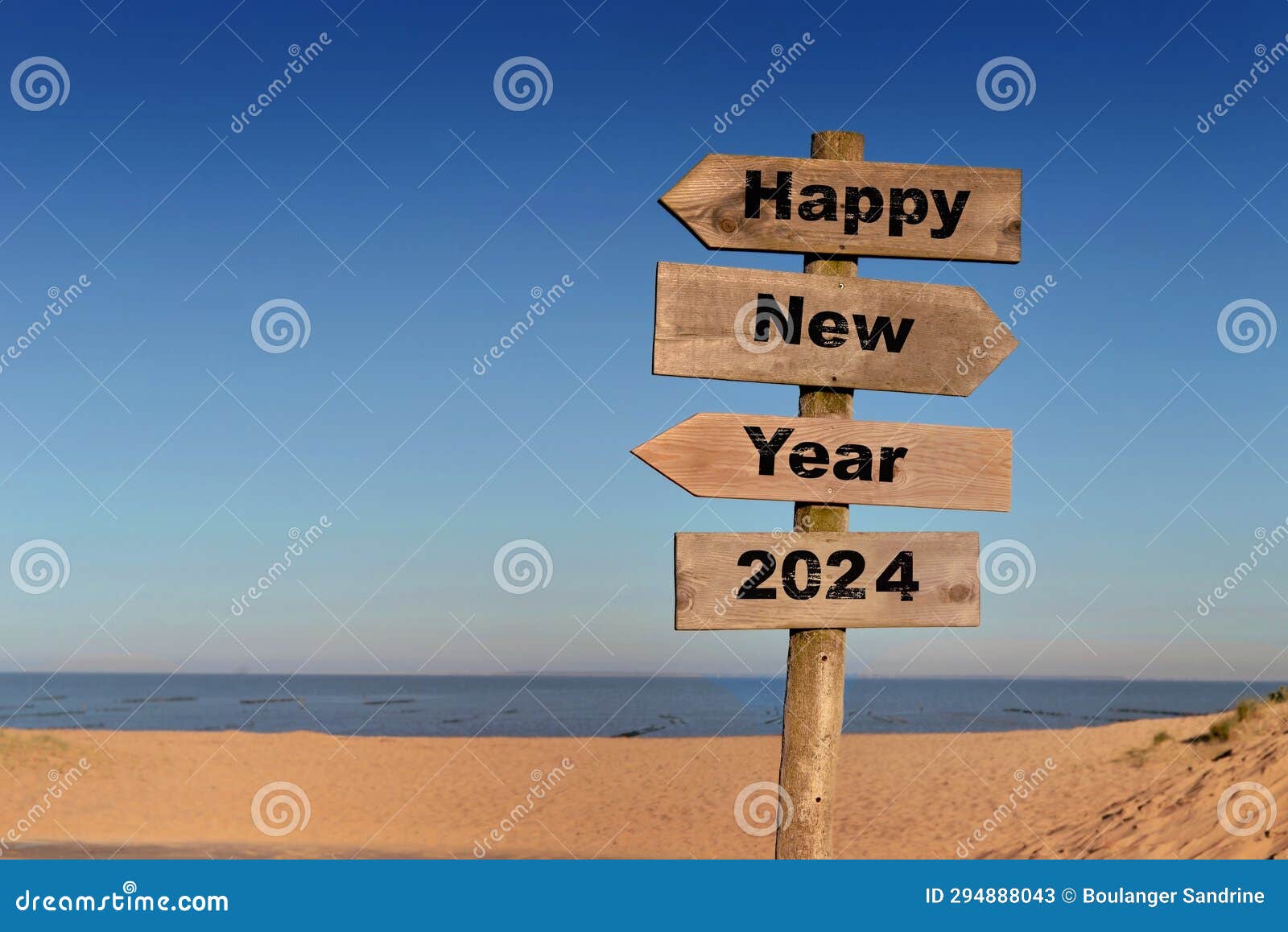 2024 Happy New Year Written on a Direction Sign in Front of a Beach ...