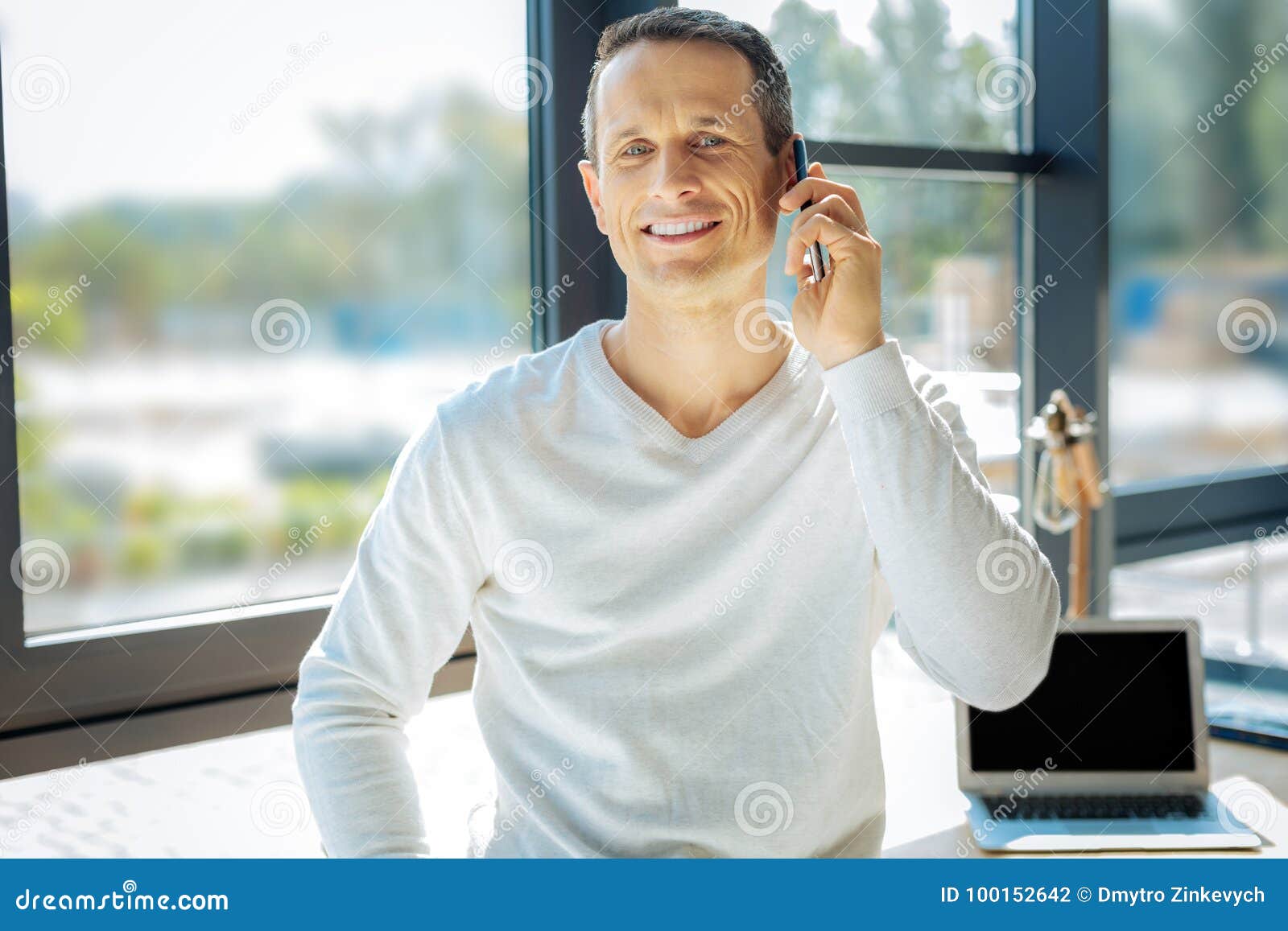 Happy Nice Man Having a Phone Conversation Stock Photo - Image of ...