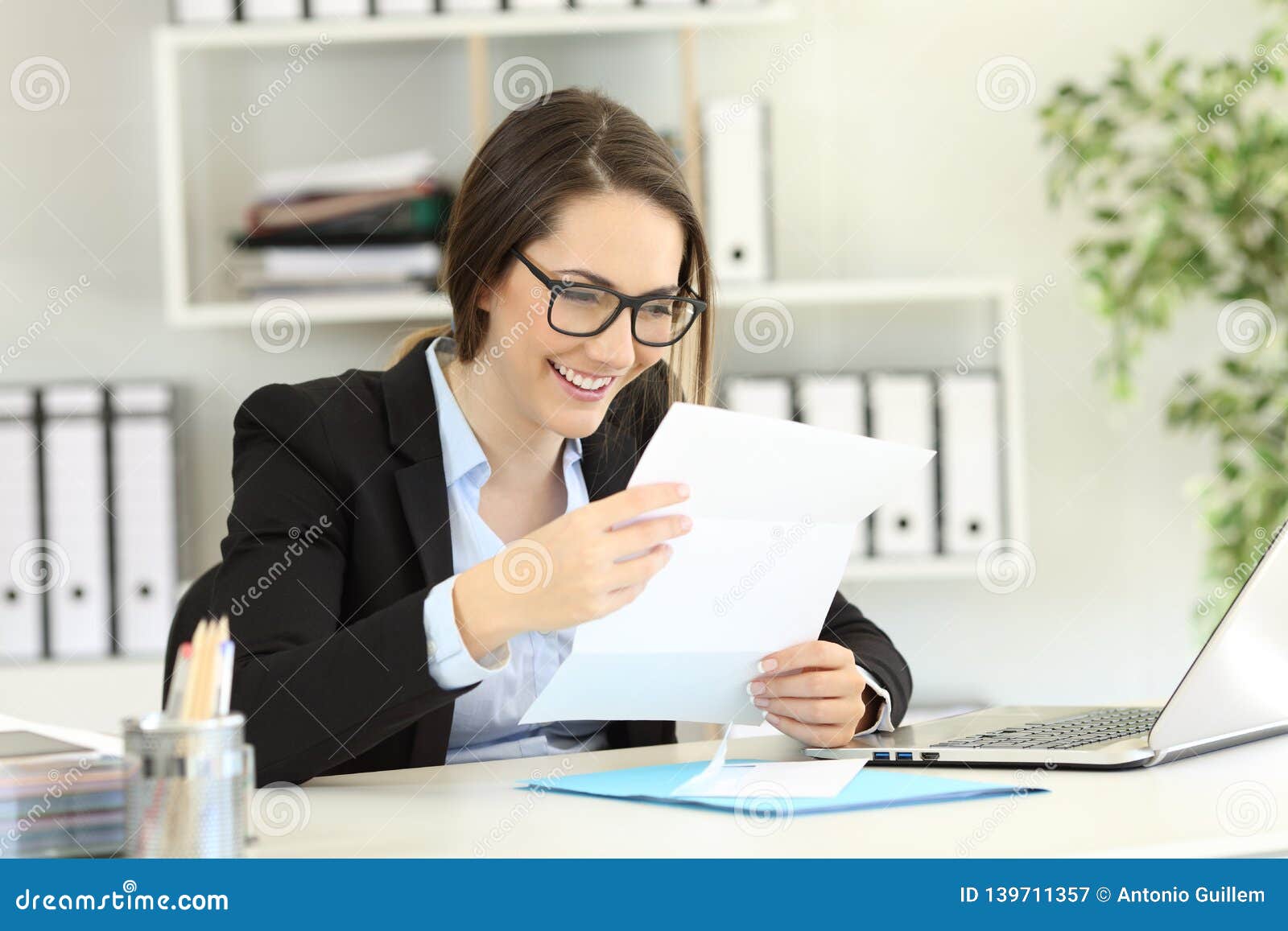Happy Office Worker Reading a Letter Stock Image - Image of good ...