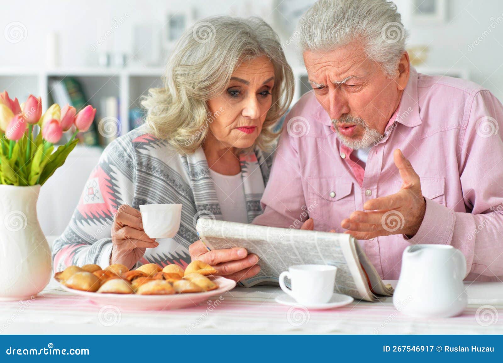 Happy Old Couple Reading Newspaper during Breakfast Stock Image - Image ...