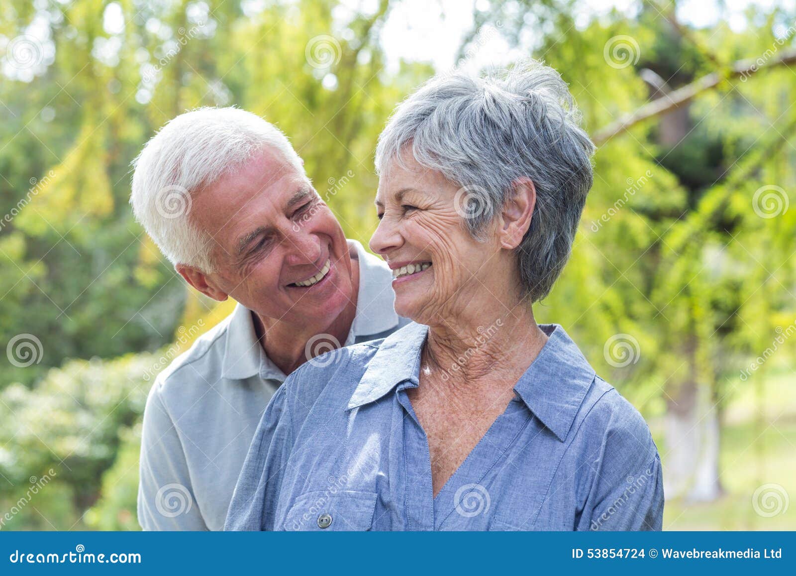 Happy old couple smiling stock photo. Image of amusing - 53854724