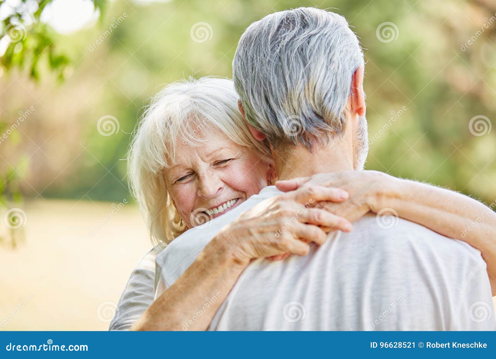 Happy Old Lady Hugging a Man Stock Image - Image of nature, love: 96628521