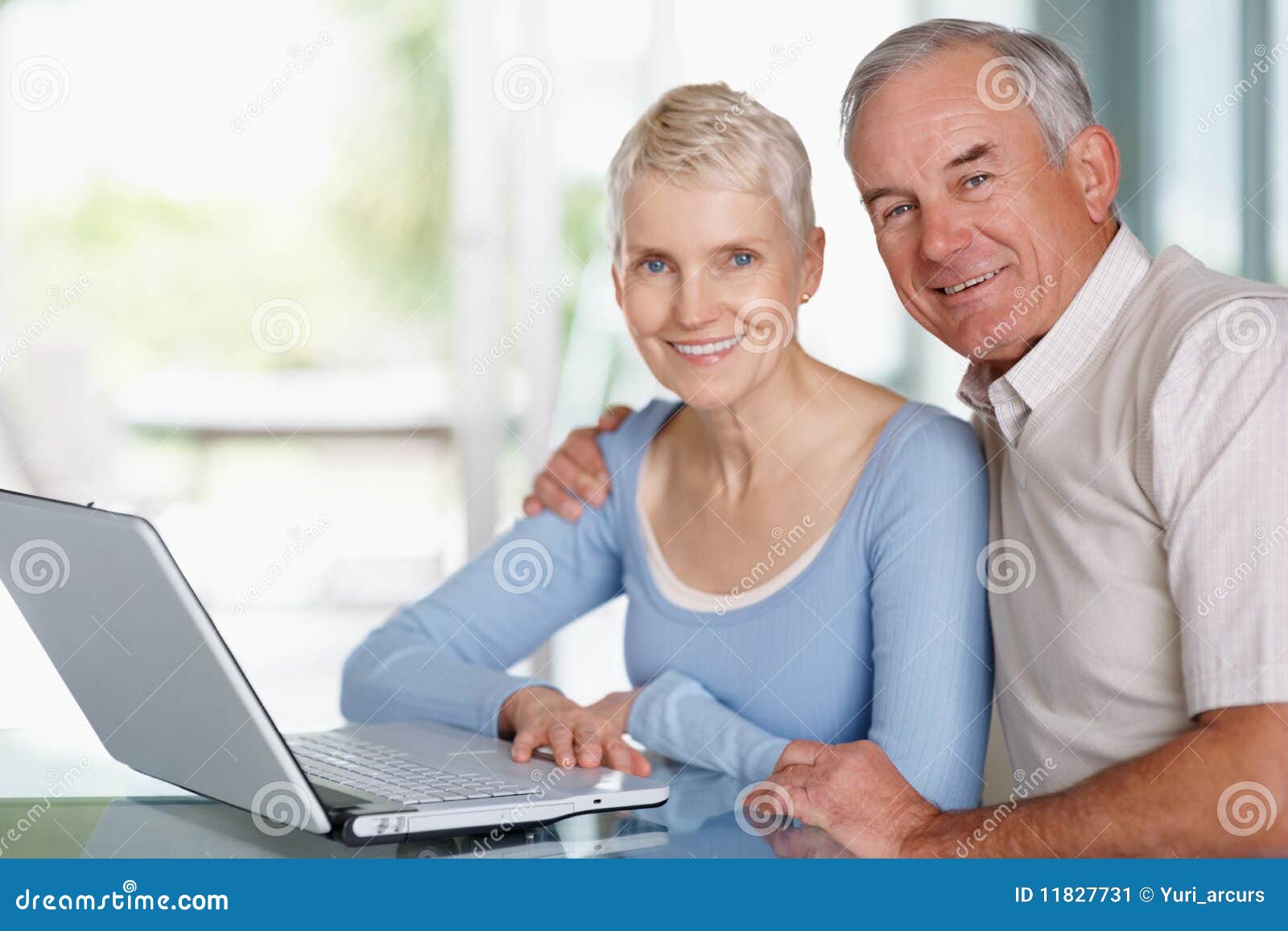 Happy Older Couple Using a Laptop with Copy Space Stock Image - Image ...