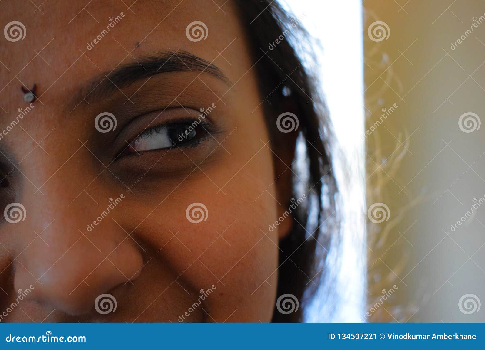 Happy One Sided Face of a Model Stock Image - Image of casual, blue ...