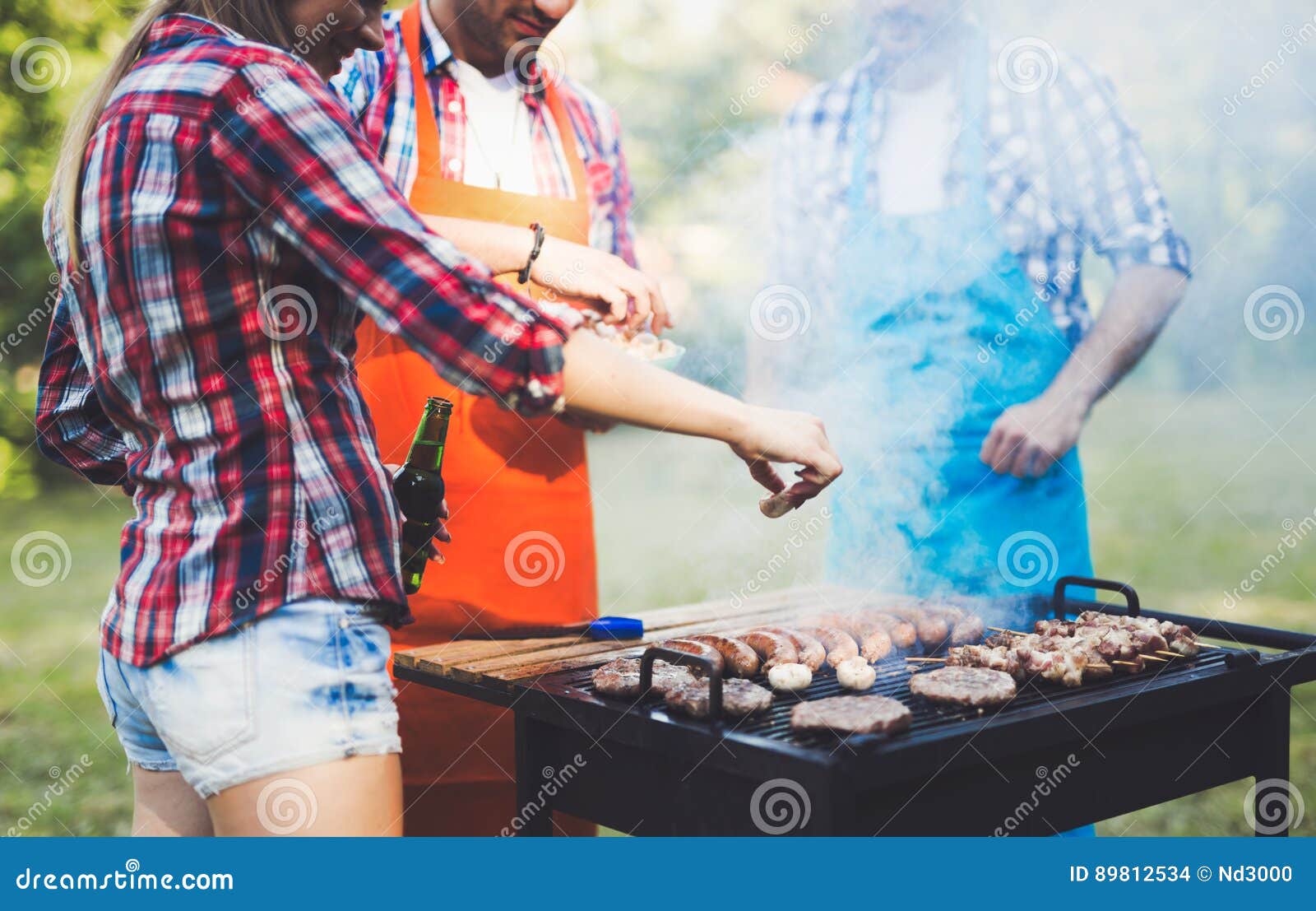 Happy Outgoing People Enjoying Bbq Stock Photo - Image of lifestyle ...