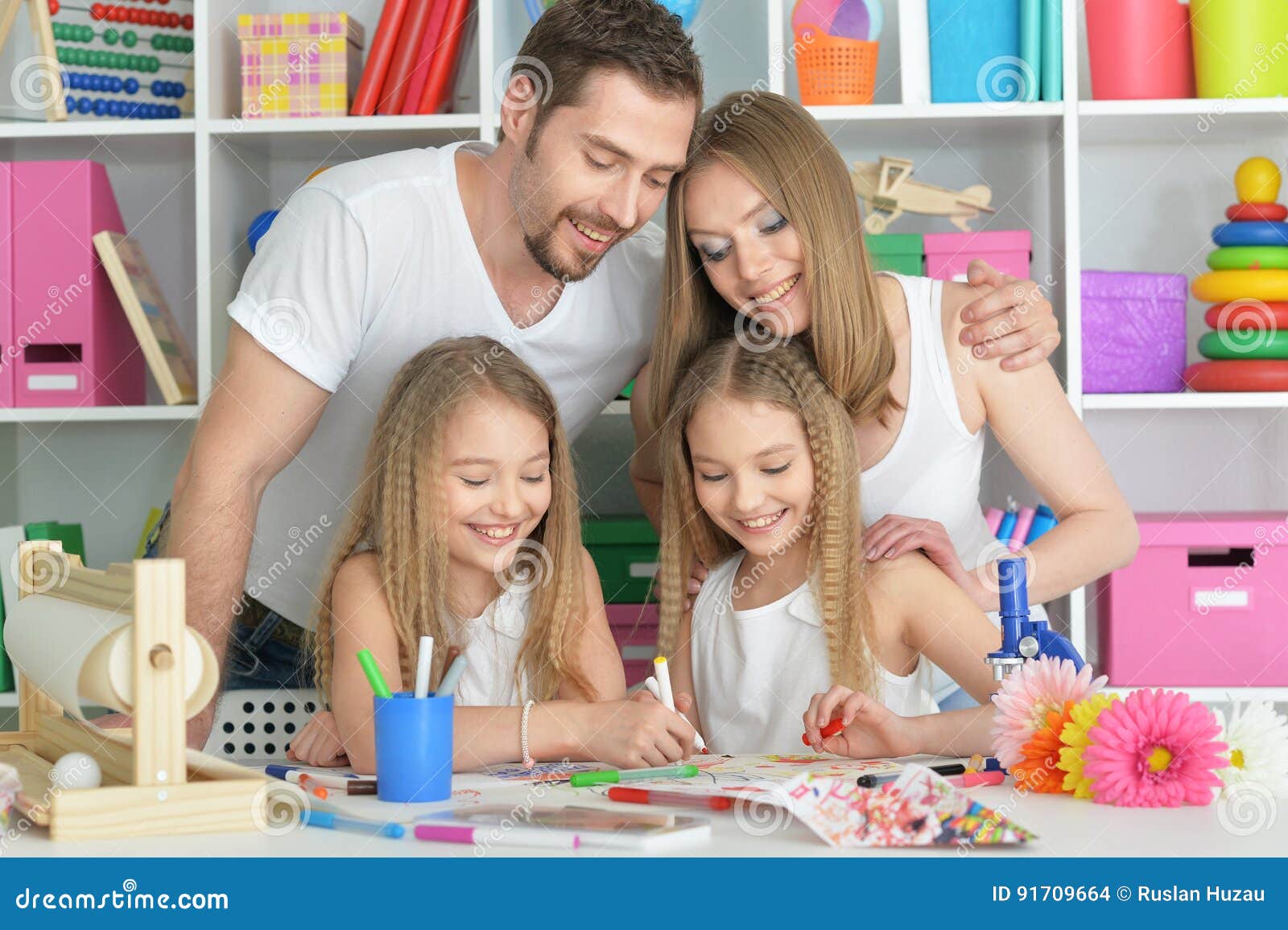 Happy Parents with Children at Home Stock Photo - Image of draw ...