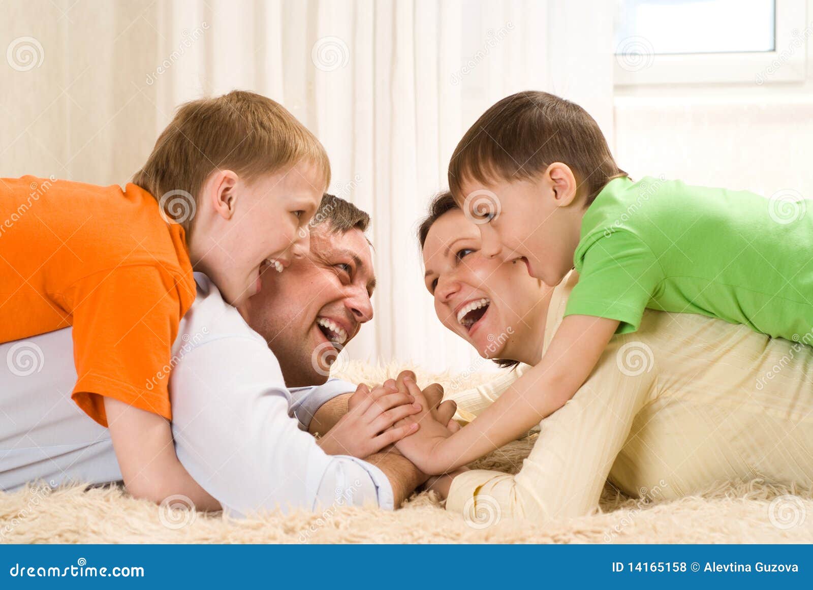 Happy Parents with His Two Sons Stock Photo - Image of friendship, love ...