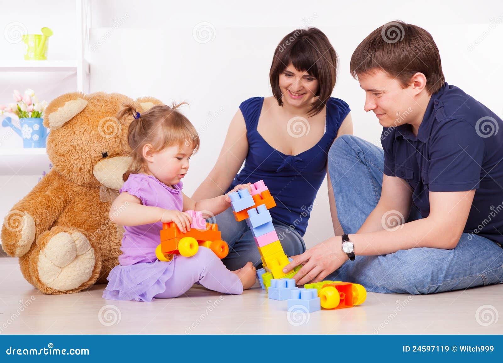 Happy Parents Playing With Child At Home Royalty Free Stock Images ...