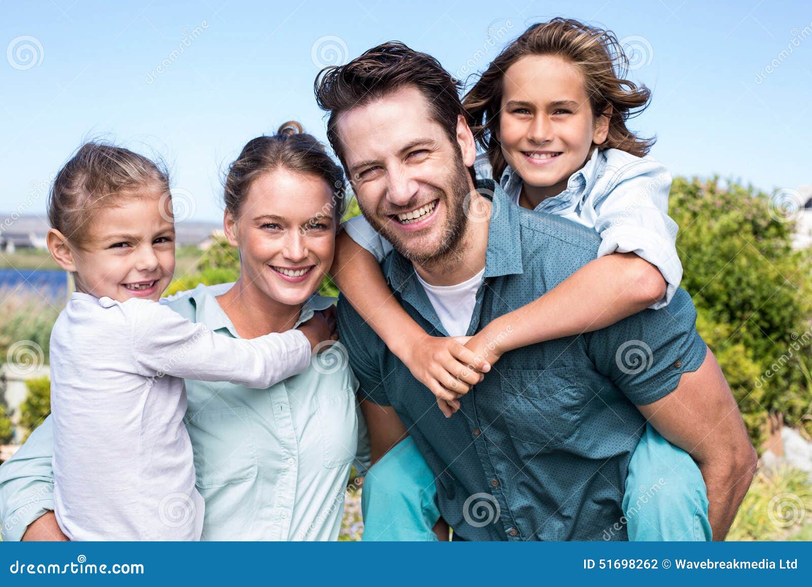 Happy Parents with Their Children Stock Photo - Image of affection ...