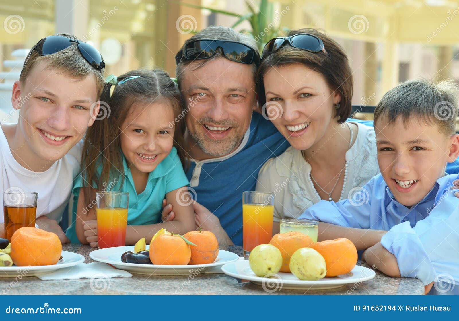 Happy Parents with Their Children Eating Stock Photo - Image of ...