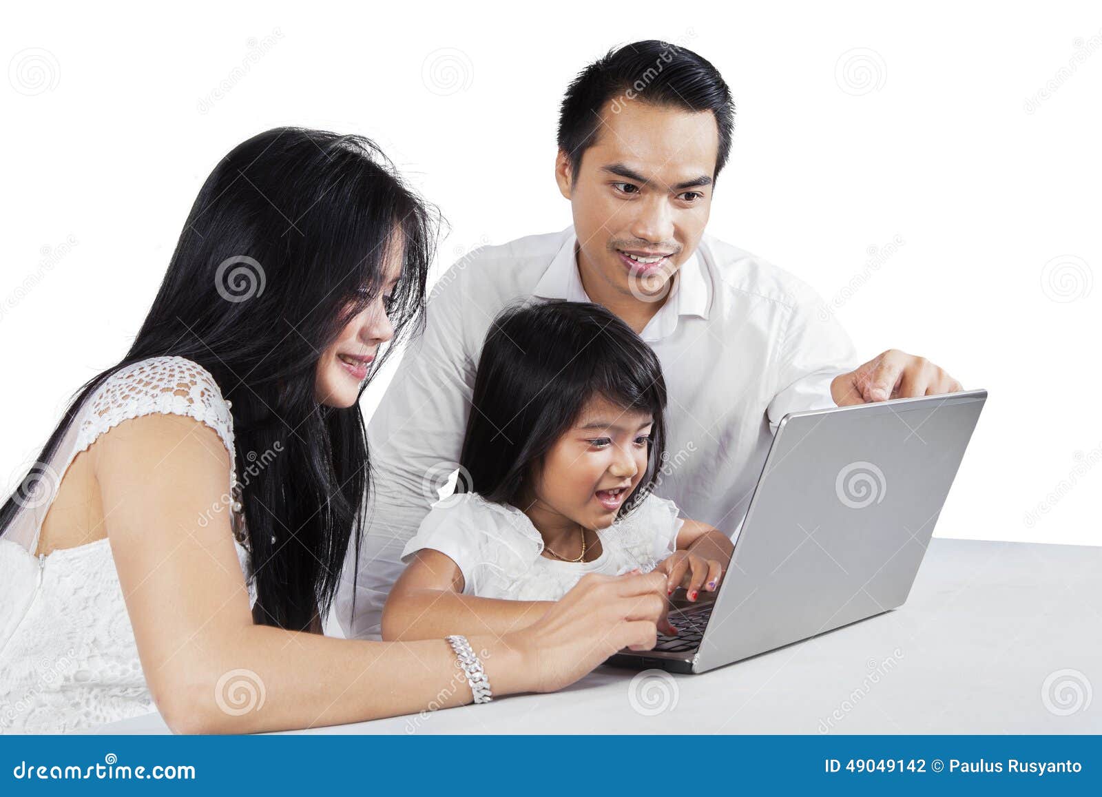 Happy Parents Using Laptop with Their Child Stock Photo - Image of ...