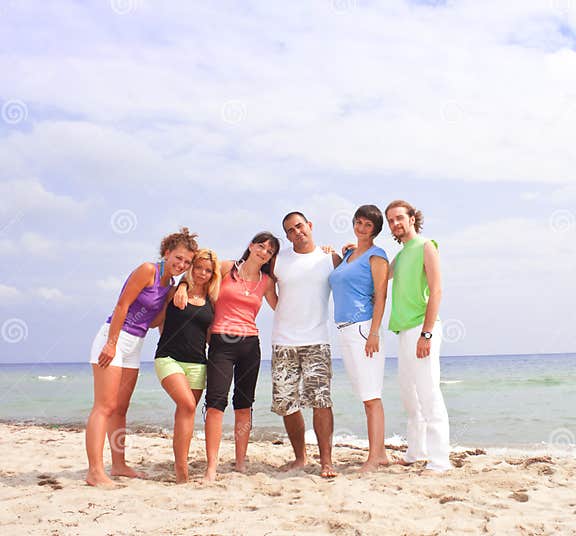 Happy people on the beach stock image. Image of female - 12468333