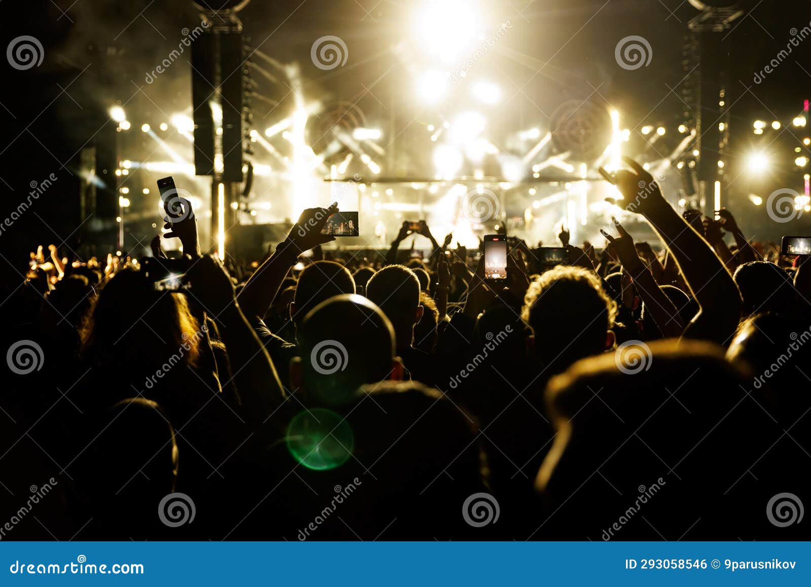 Happy People Crowd with Raised Hands on a Dance Floor during a Concert ...