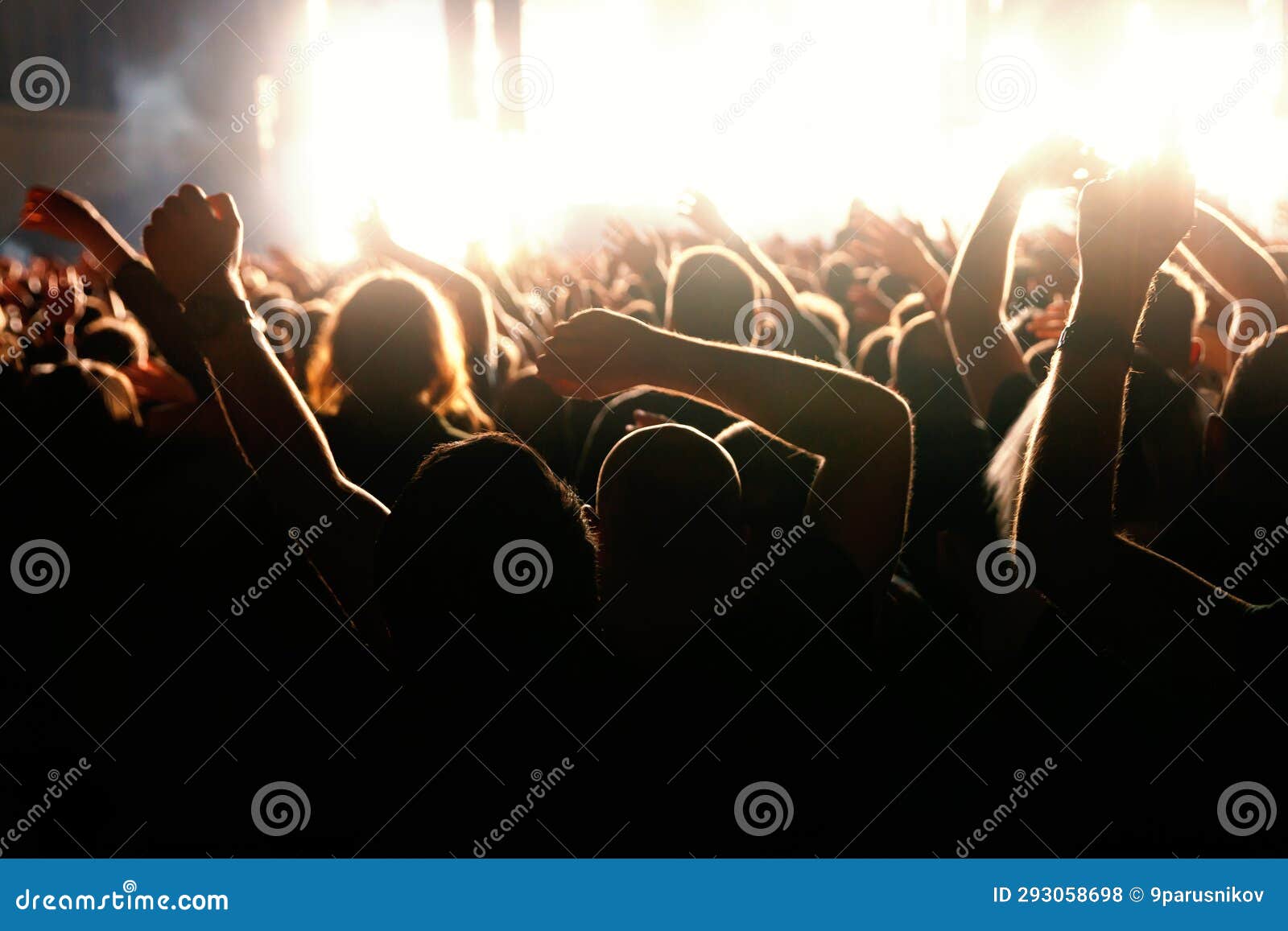 Happy People Crowd with Raised Hands on a Dance Floor during a Concert ...