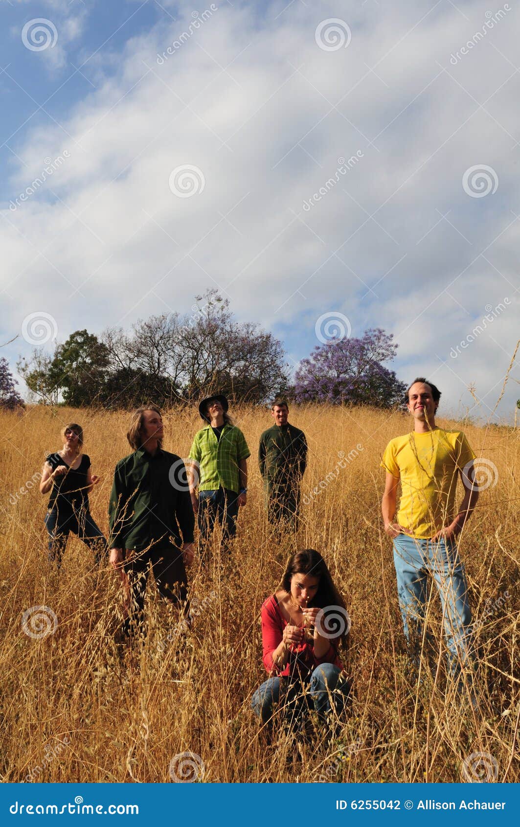 Happy people in field stock photo. Image of blue, nature - 6255042
